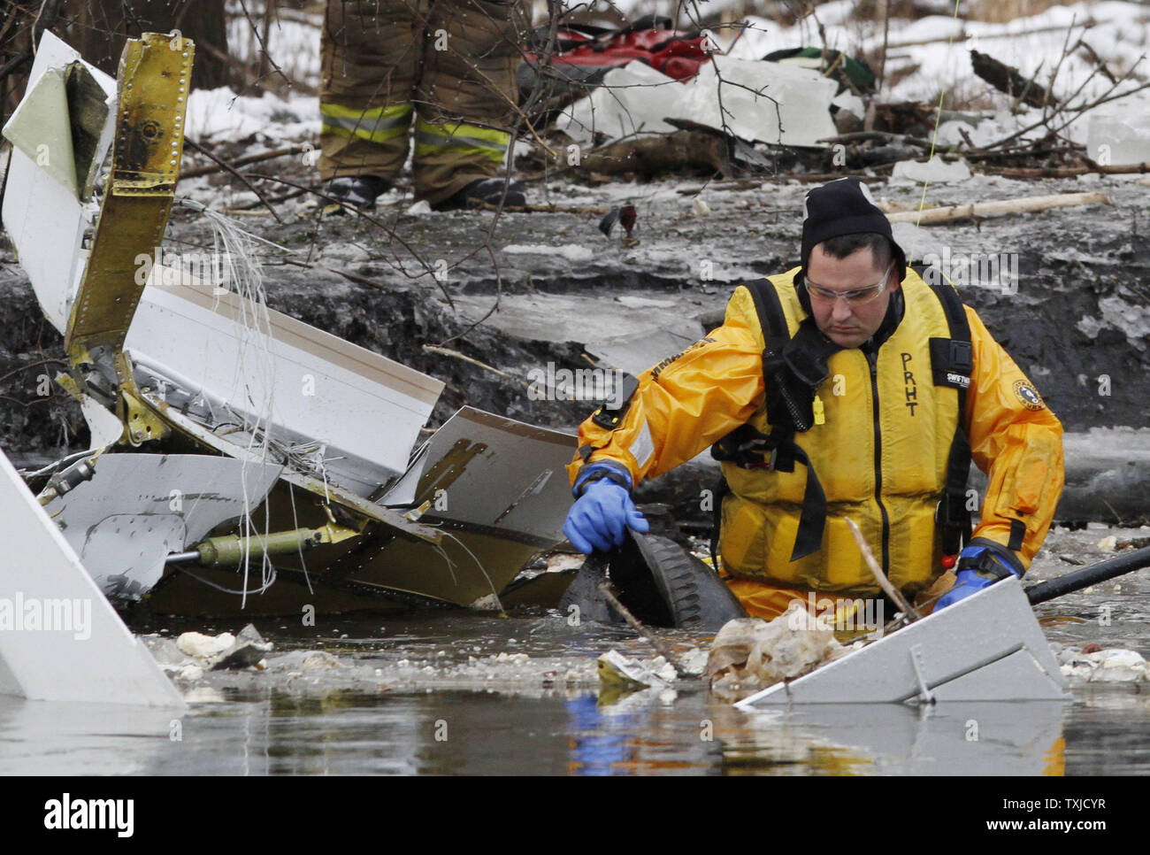 Plane crash fireman hi-res stock photography and images - Alamy