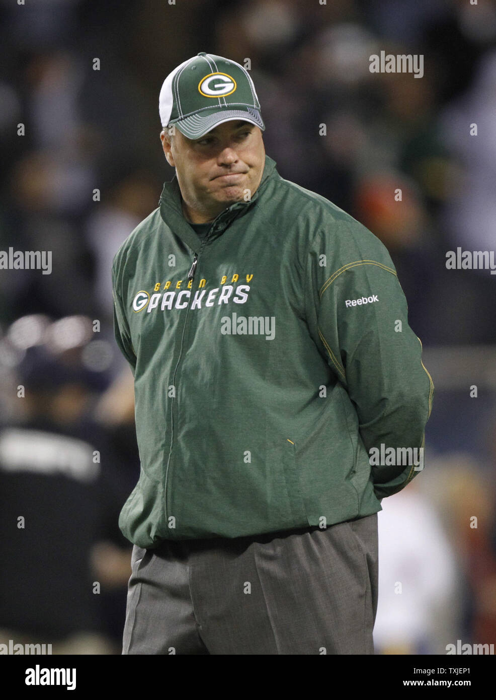 Green Bay Packers head coach Mike McCarthy stands on the field during ...