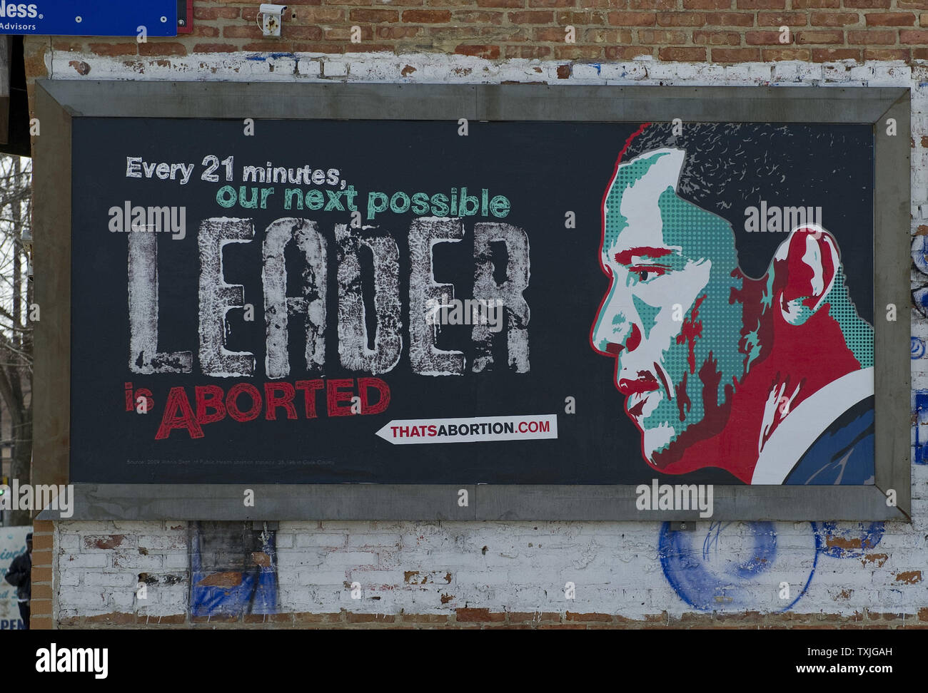 An anti-abortion billboard depicting U.S. President Barack Obama hangs ...