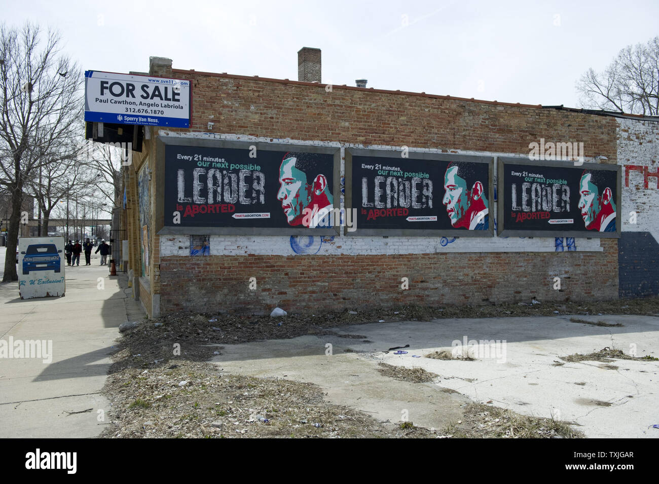 An anti-abortion billboard depicting U.S. President Barack Obama hangs ...