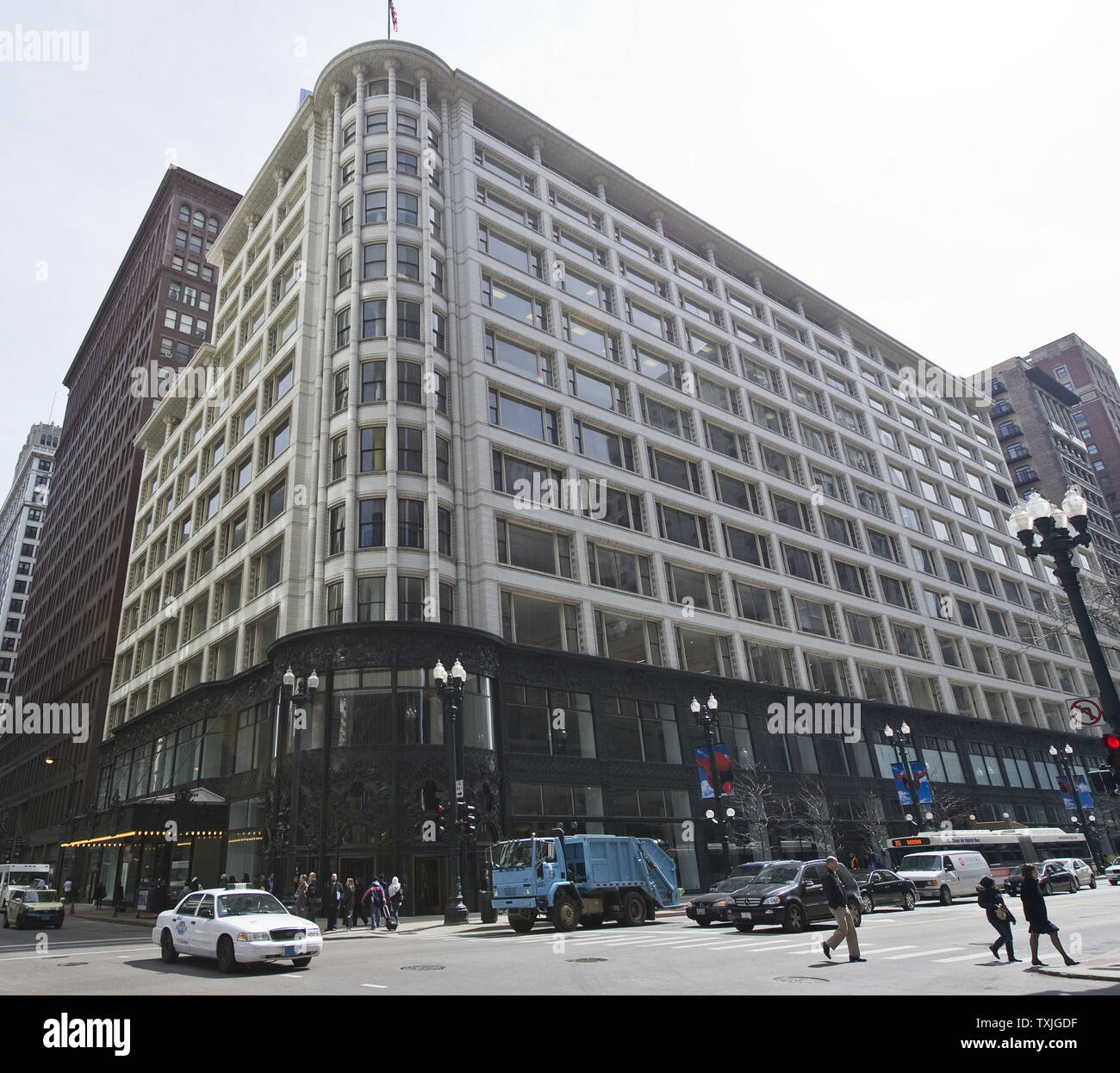 Cars drive by the Sullivan Center, formerly known as the Carson, Pirie ...