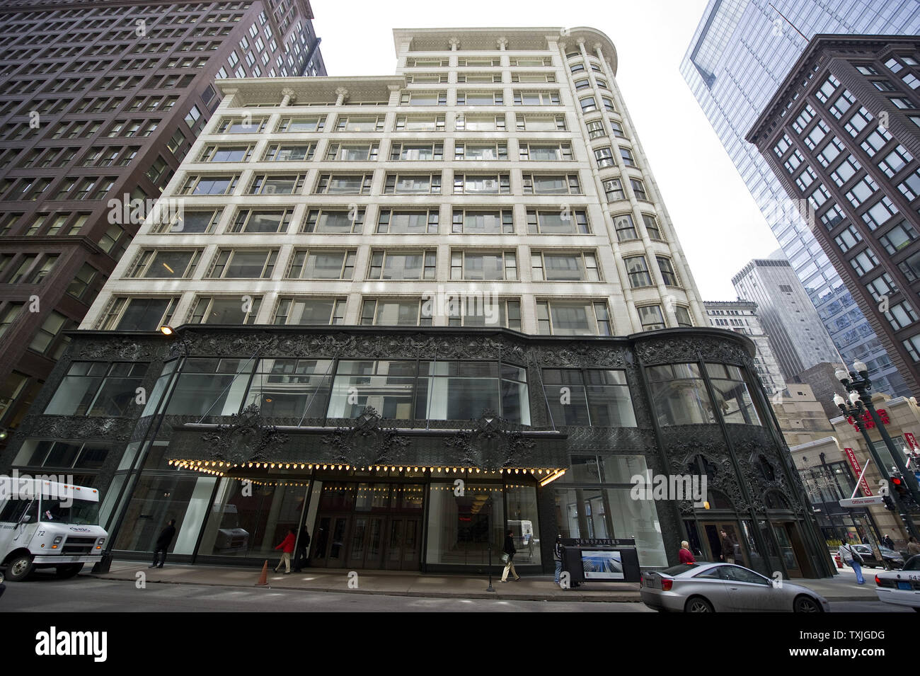 Cars drive by the Sullivan Center, formerly known as the Carson, Pirie ...