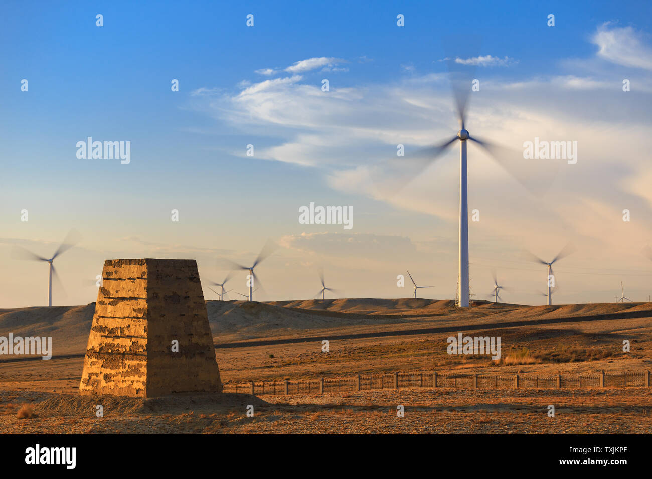 Beacon towers and wind turbines Stock Photo - Alamy