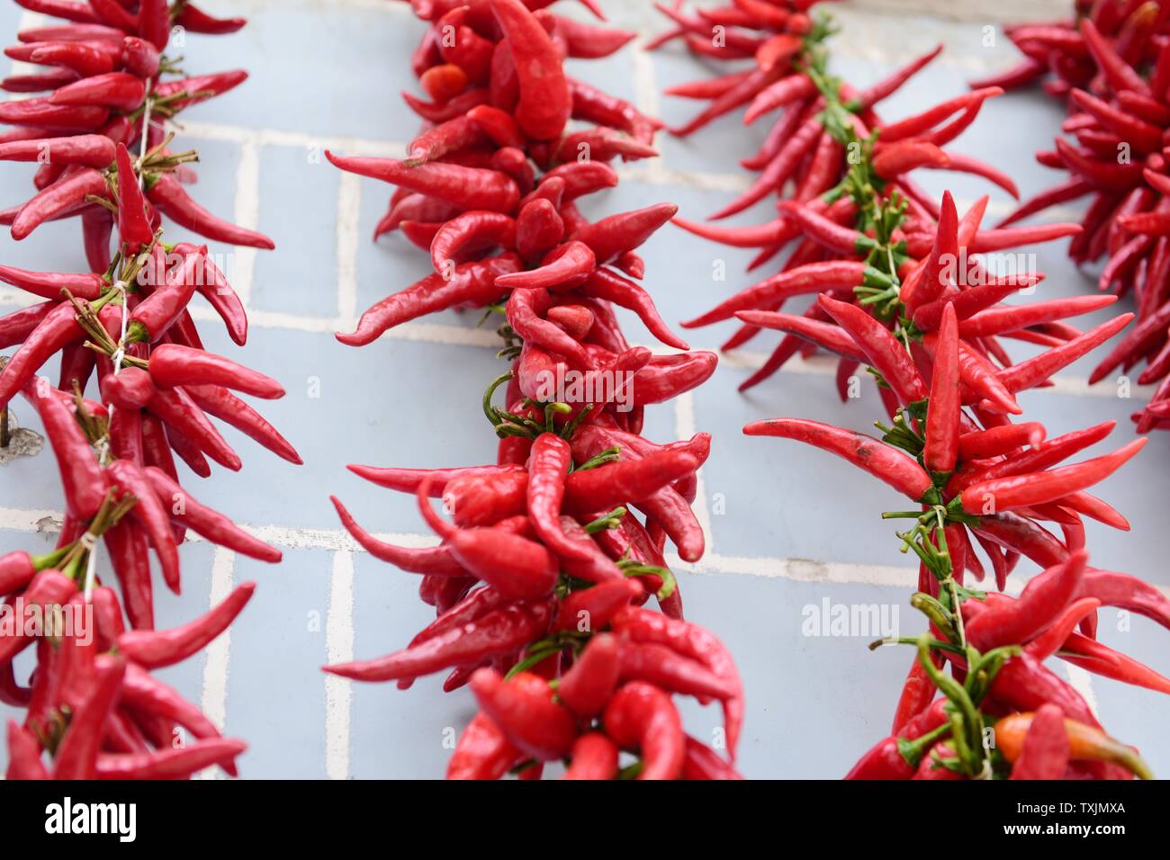 Farmhouse red pepper decoration Stock Photo - Alamy
