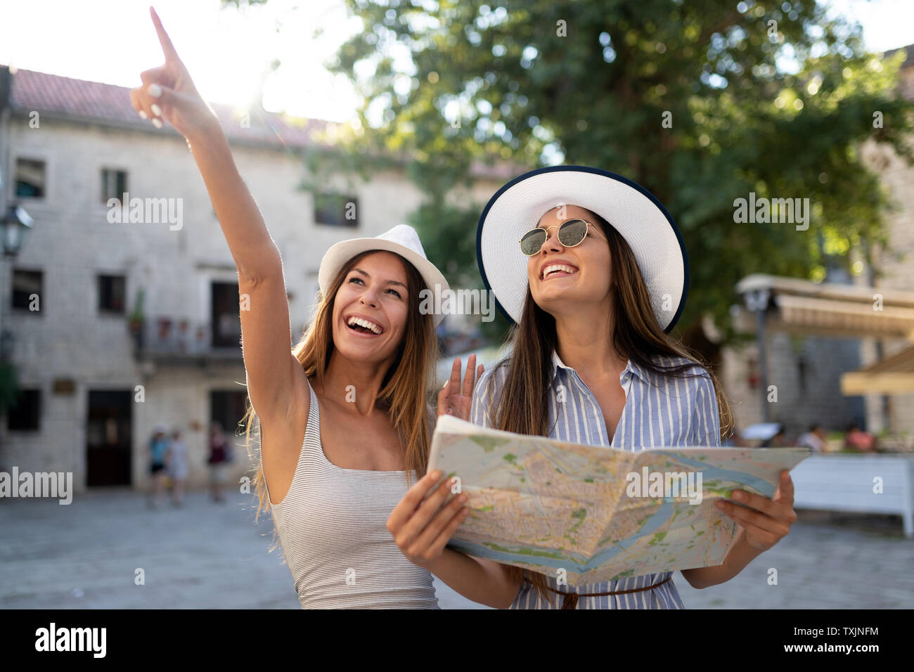 Girl friends travelling summer vacation exploring to discover carefree ...