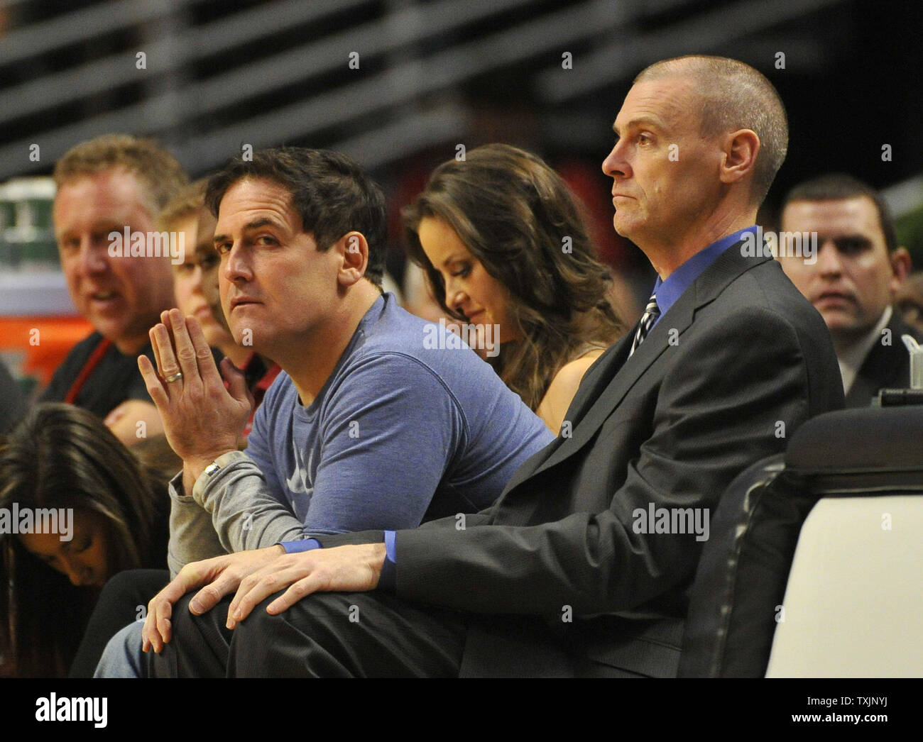 Dallas Mavericks owner Mark Cuban (L) sits with head coach Rick ...