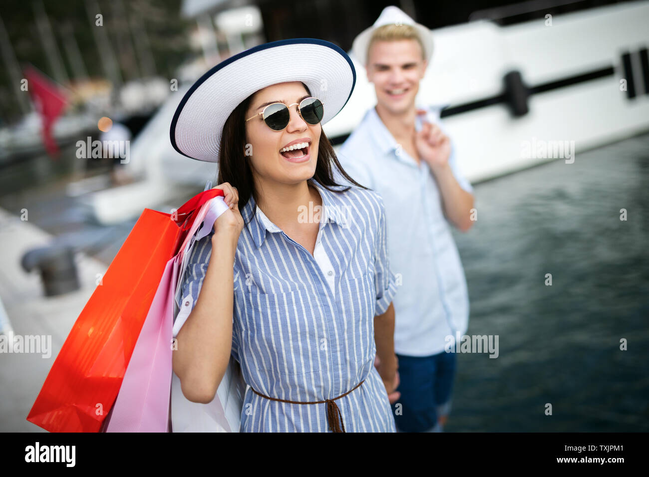 Happy attractive loving couple enjoy shopping together Stock Photo - Alamy