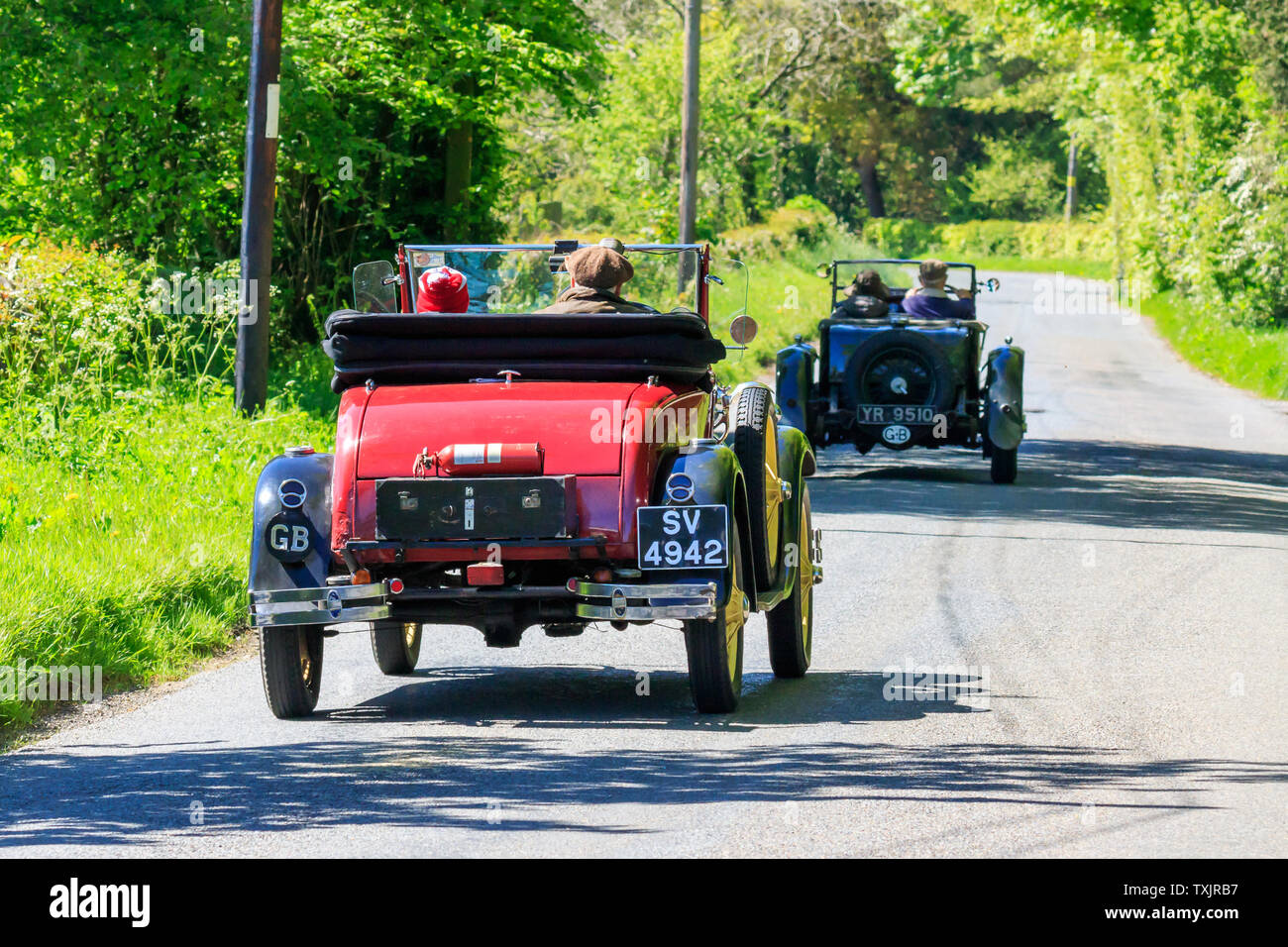 Car driving on two wheels hi-res stock photography and images - Alamy