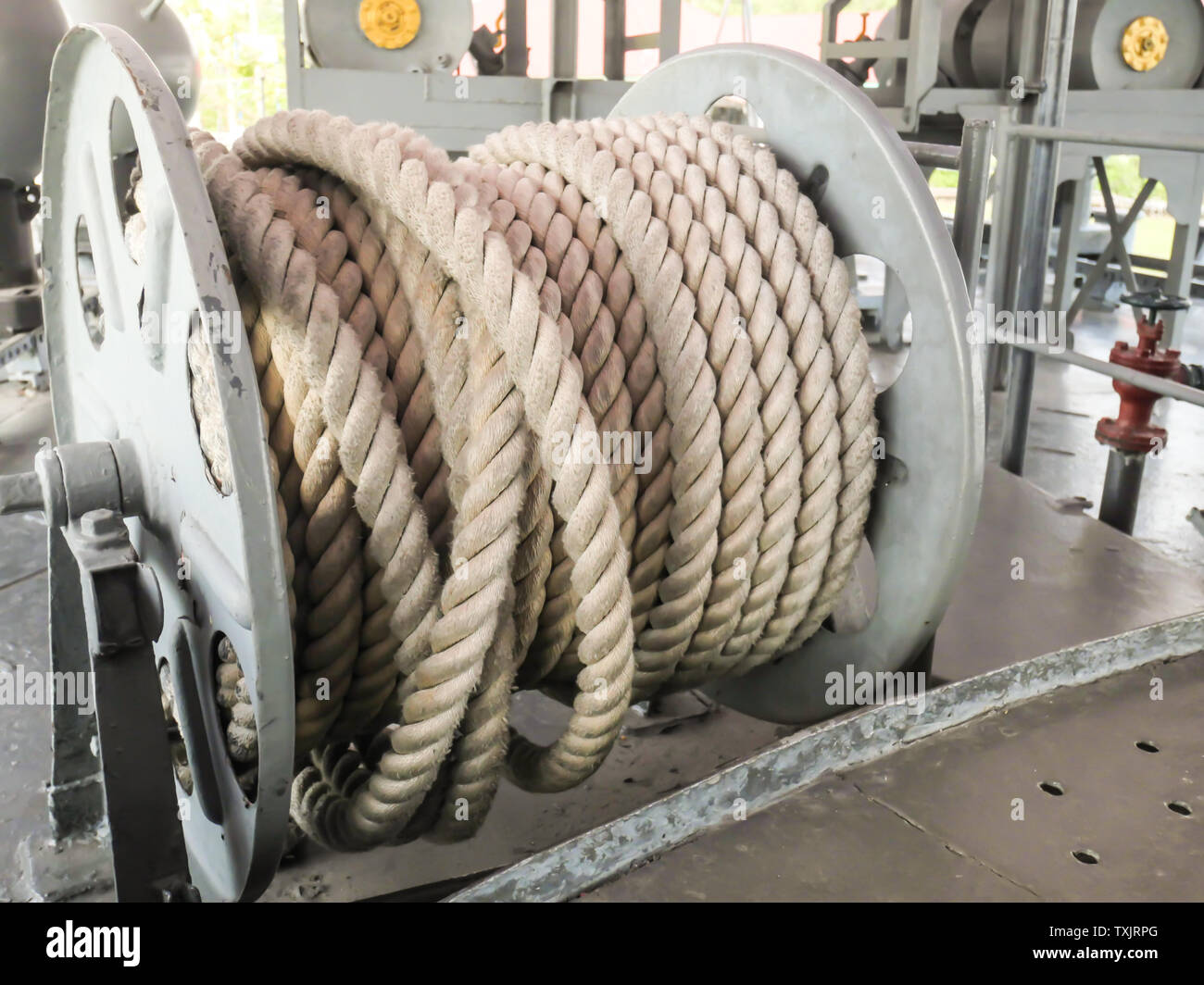 Rope reel old frayed boat, Spiral of rope, Coiled rope on boats deck ...