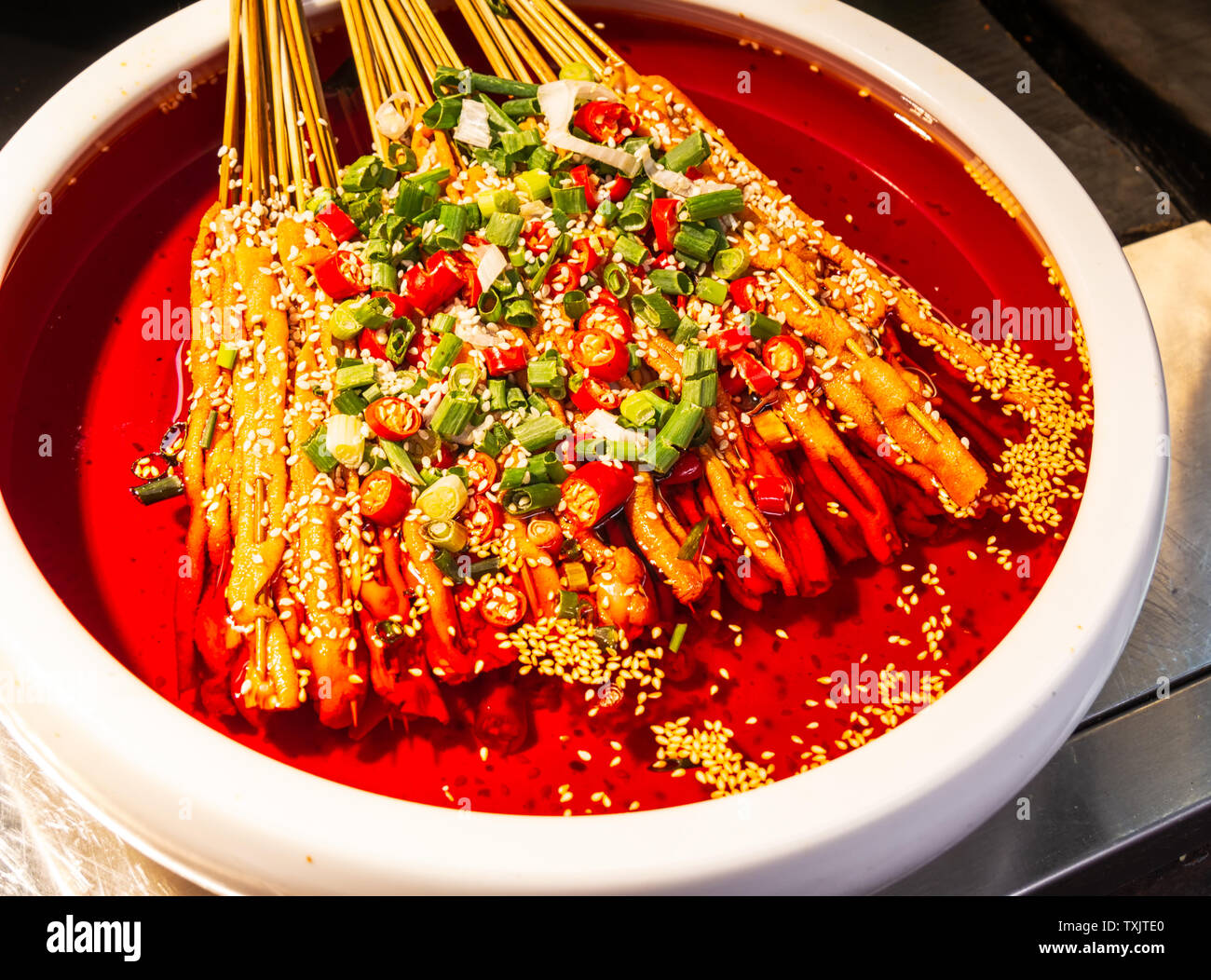 Sichuan spicy duck intestine Stock Photo - Alamy