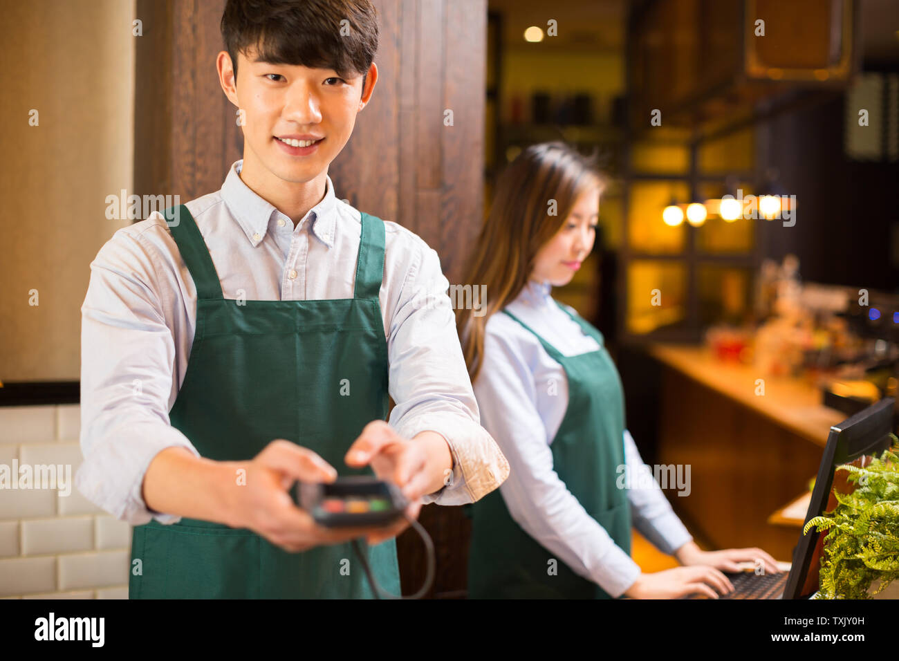 Teen waitress restaurant hi-res stock photography and images - Alamy