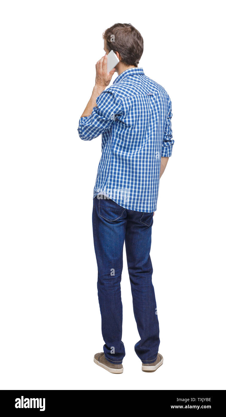 back view of a man talking on the phone. Student in plaid shirt talking ...