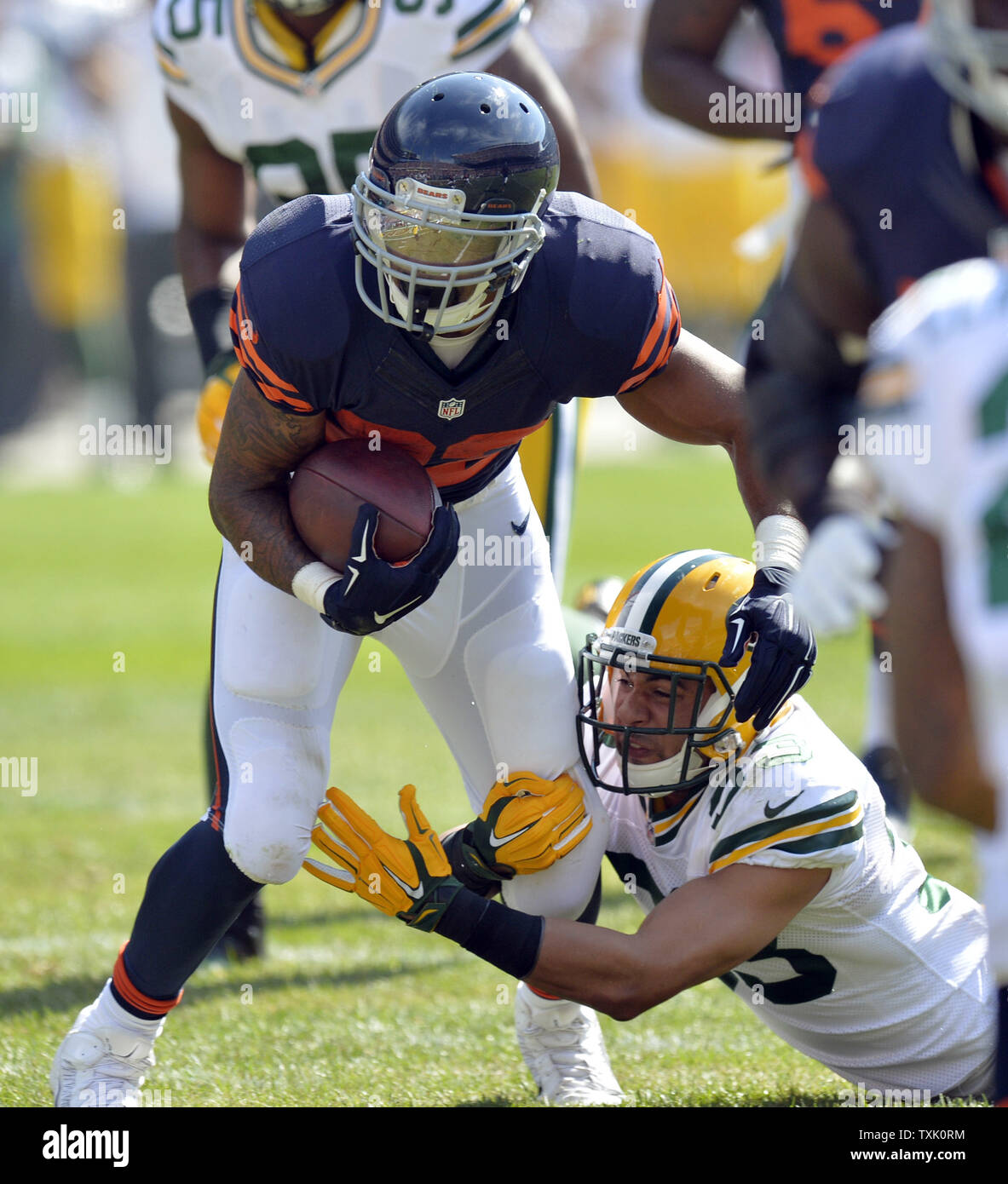 Green Bay Packers free safety Micah Hyde (R) tackles Chicago Bears ...