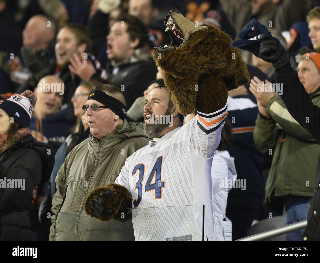 A Chicago Bears fan cheers during the first quarter against the Dallas ...