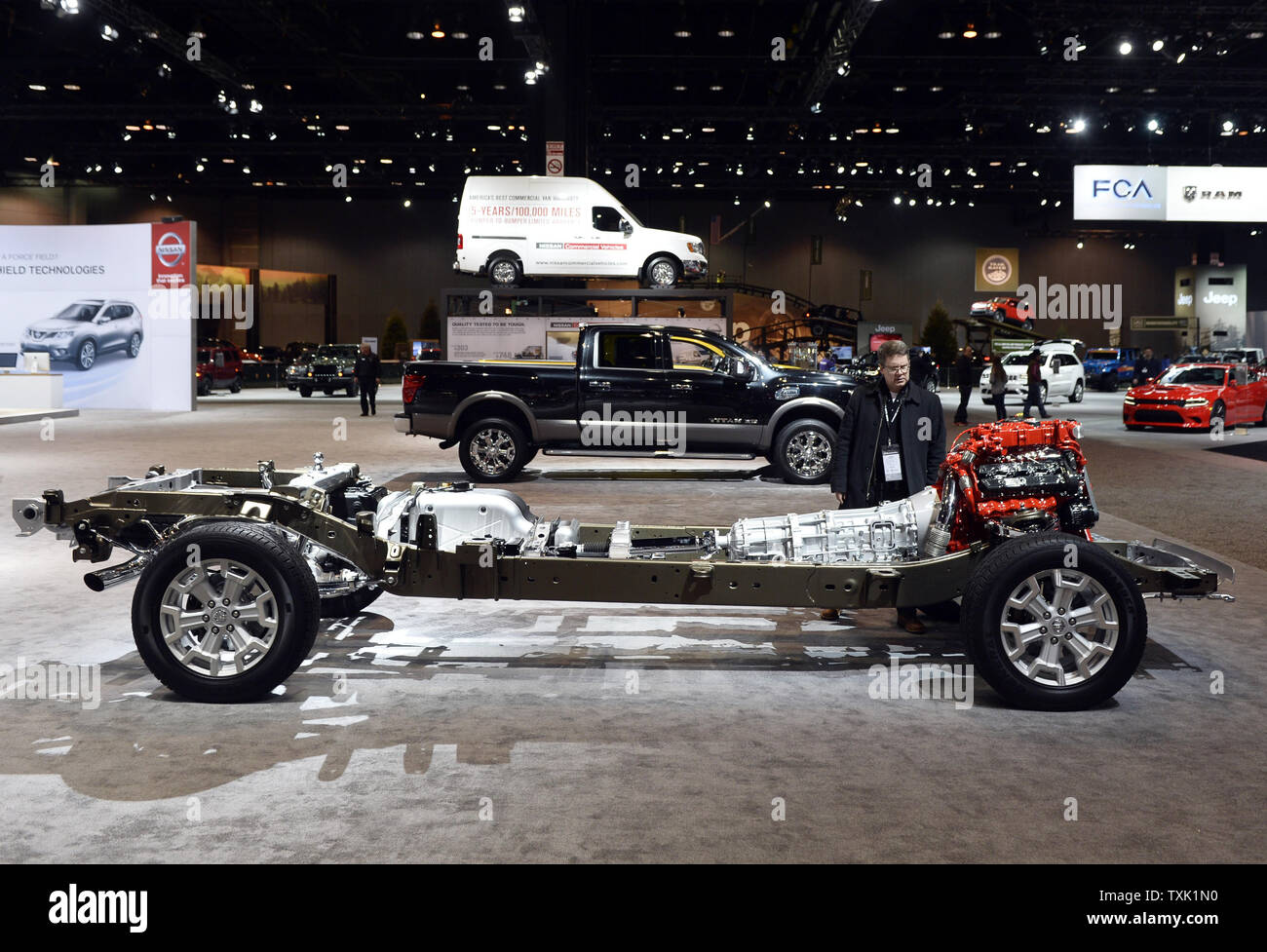The chassis and power train for a Nissan Titan pickup truck is shown at ...