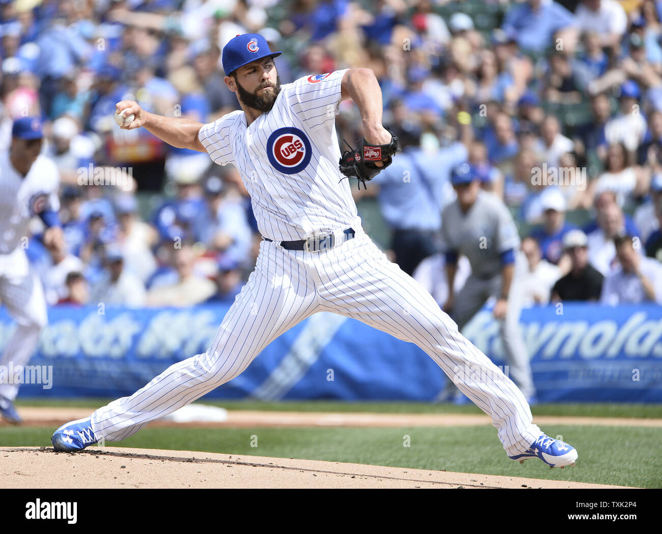 Chicago Cubs starting pitcher Jake Arrieta delivers during the first ...