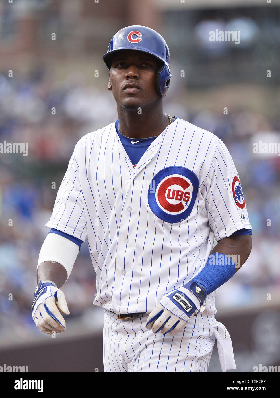 Chicago Cubs' Junior Lake stands on first base during the fourth inning ...