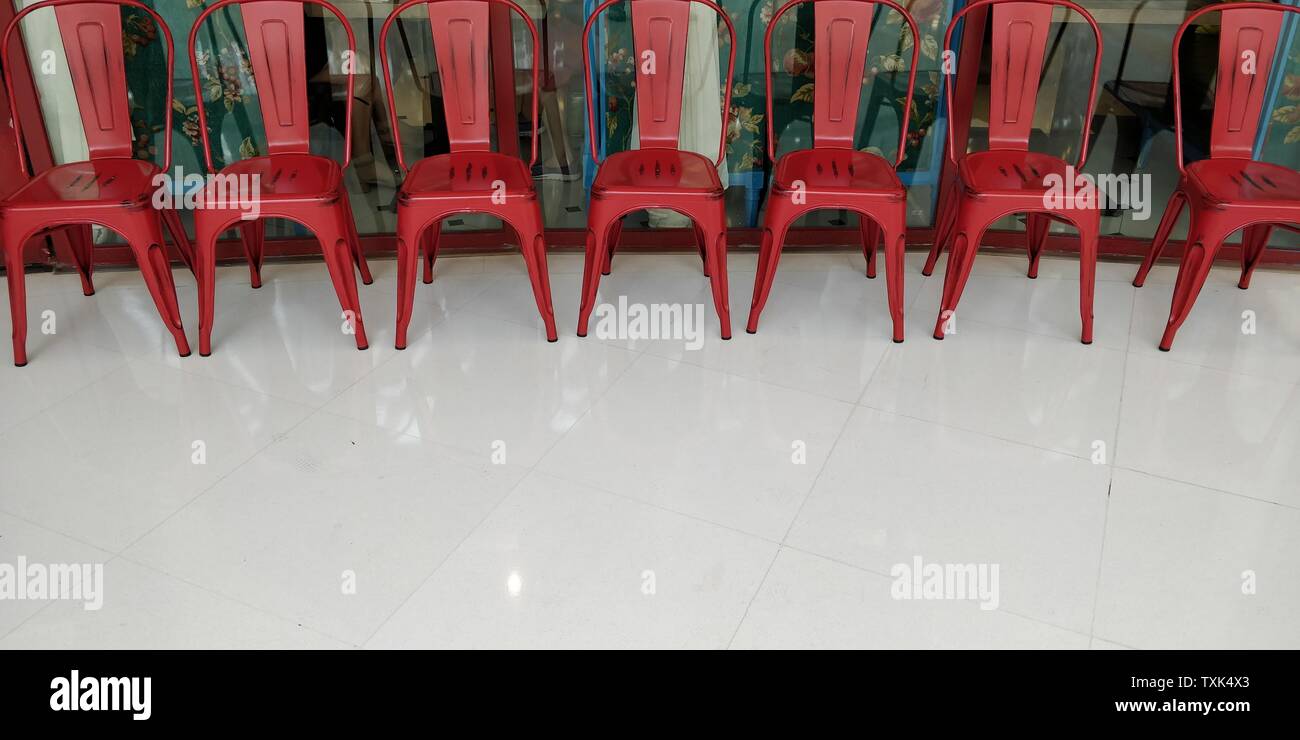 Chairs and stools in various colors and shapes Stock Photo - Alamy