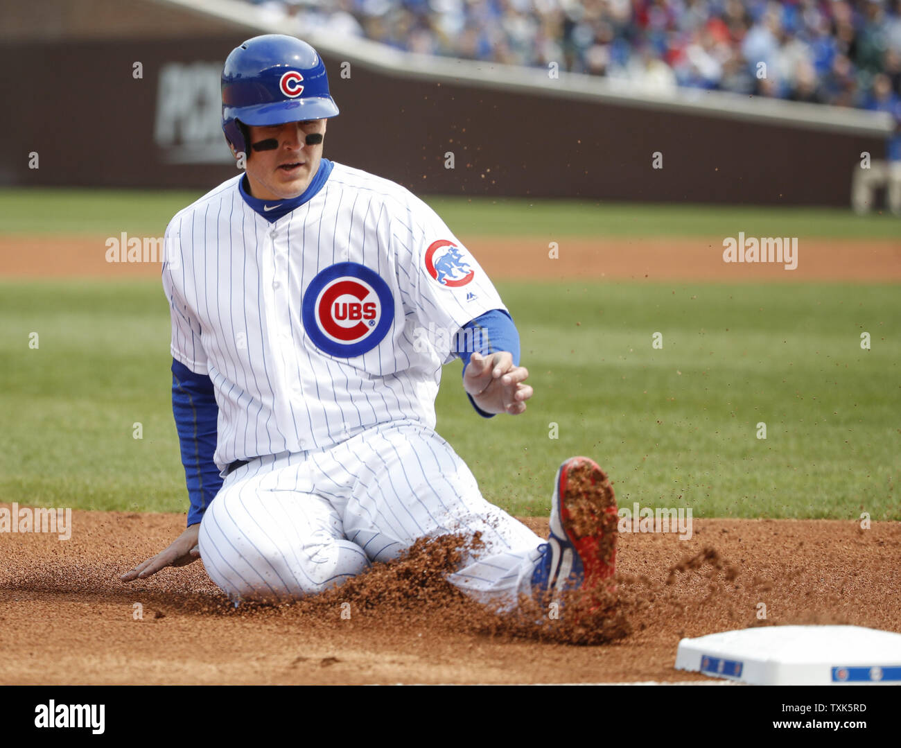 Chicago Cubs first baseman Anthony Rizzo steals third base against the ...