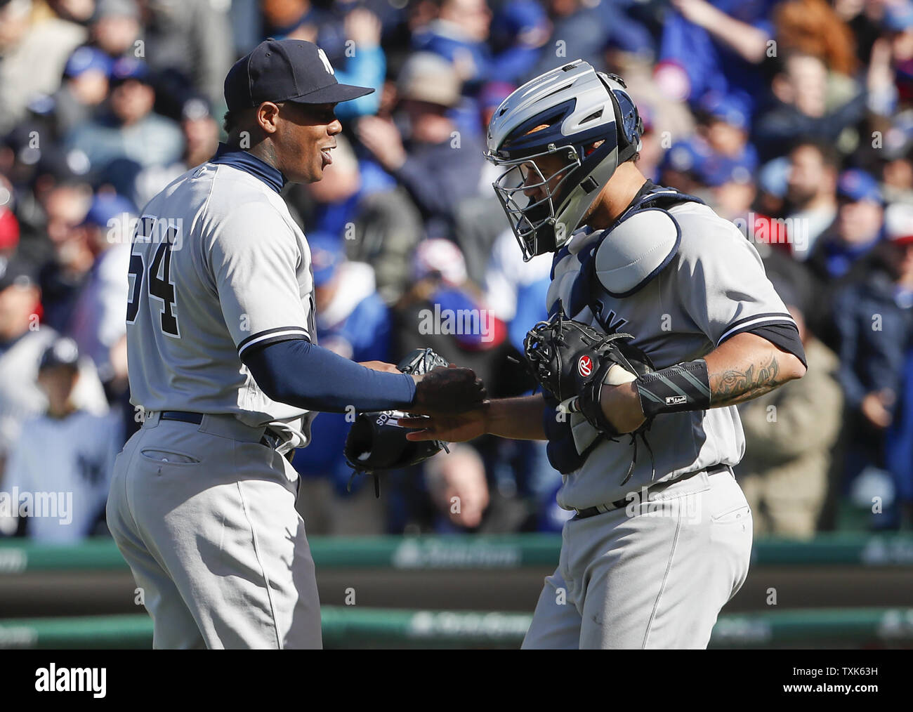 New York Yankees relief pitcher Aroldis Chapman (L) celebrates with ...