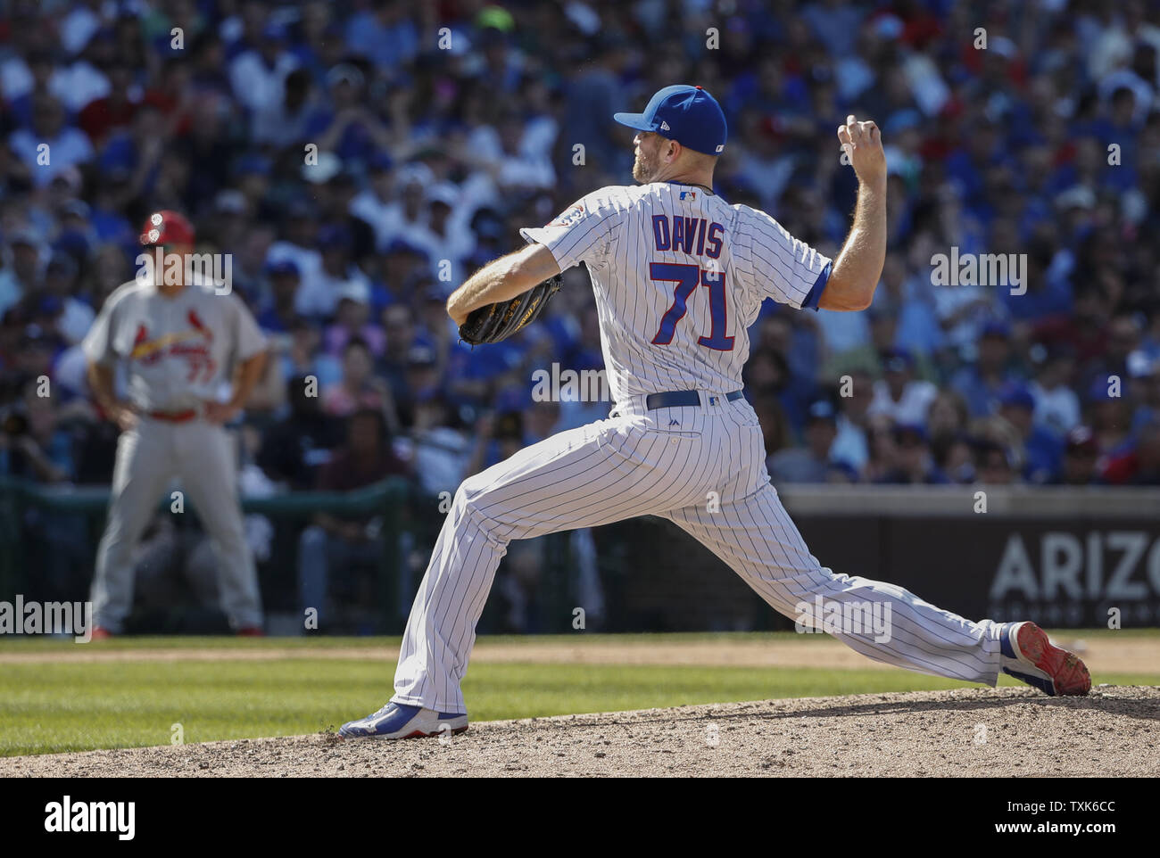 Chicago Cubs relief pitcher Wade Davis delivers against the St. Louis ...