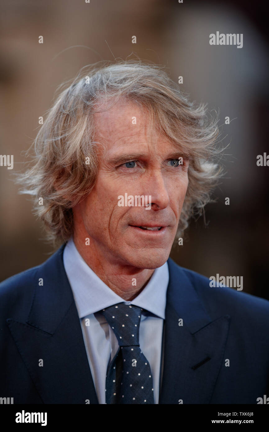 Director Michael Bay arrives on the red carpet at the Transformers The ...