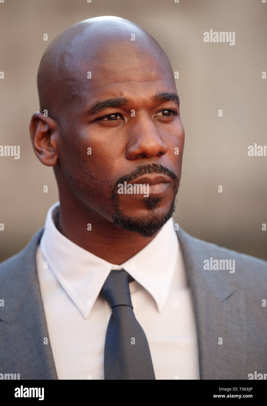 Actor Remi Adeleke arrives on the red carpet at the Transformers The ...
