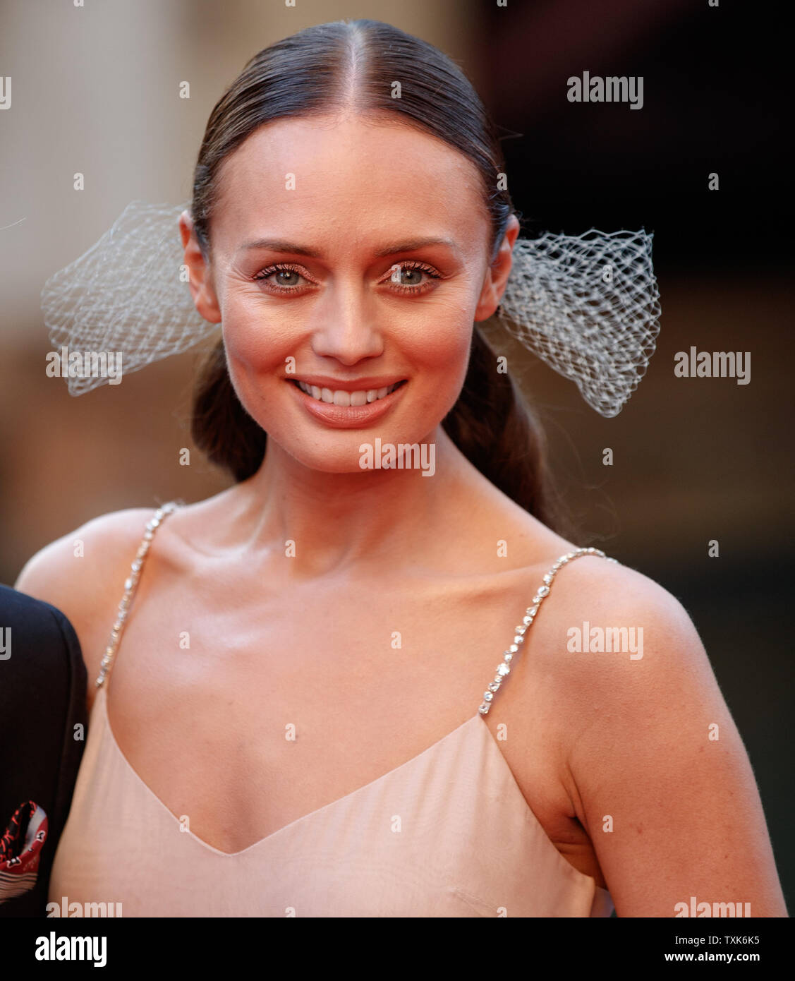 Actress Laura Haddock arrives on the red carpet at the Transformers The ...