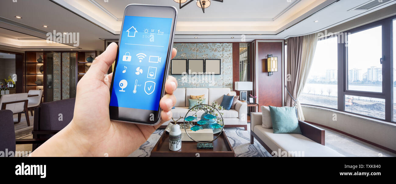 smart phone with smart home with modern living room Stock Photo - Alamy