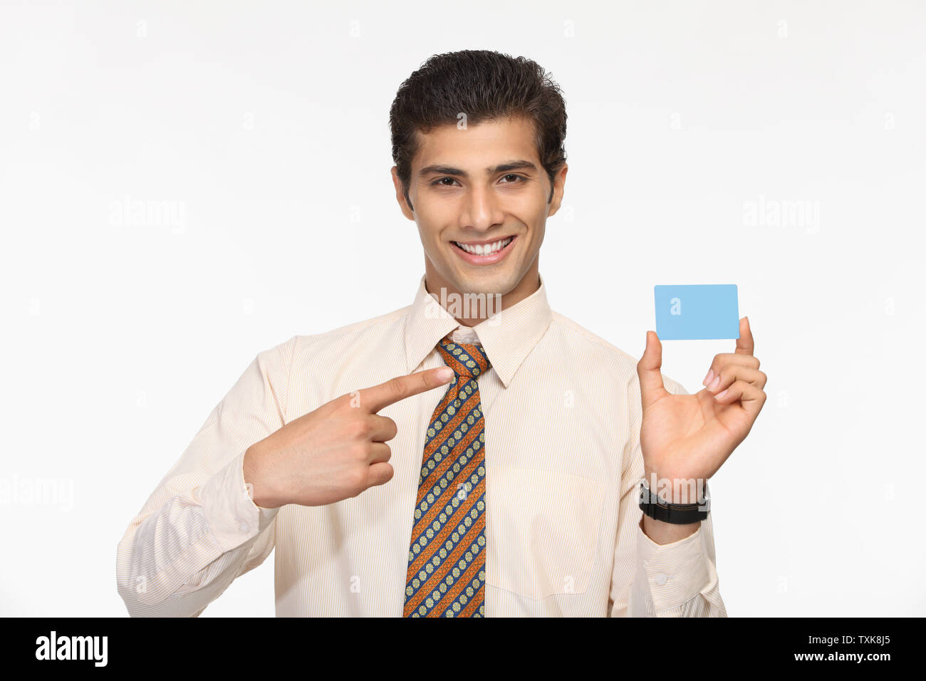 Portrait of a businessman showing a business card Stock Photo - Alamy