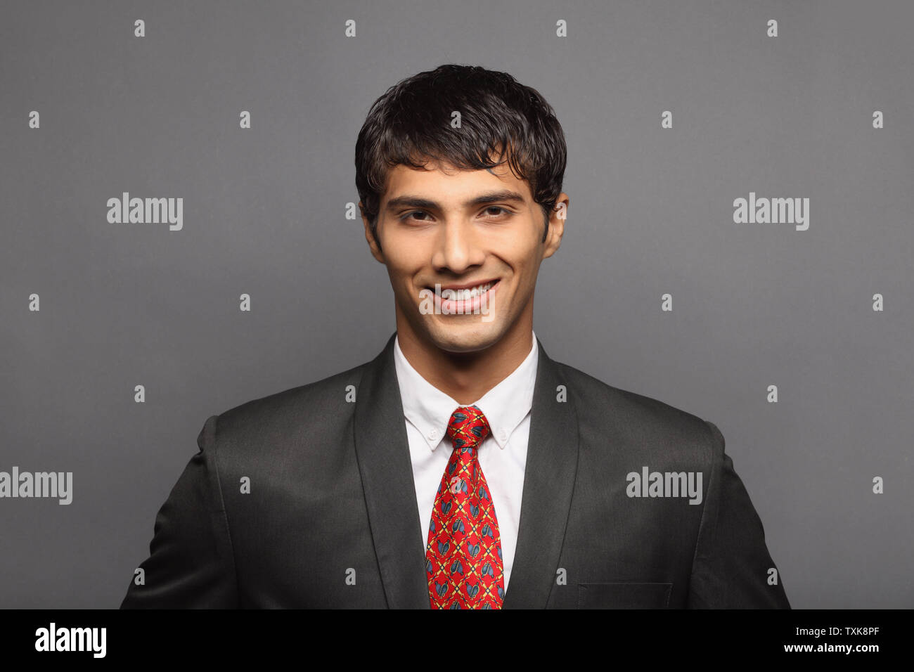 Portrait of a businessman smiling Stock Photo - Alamy