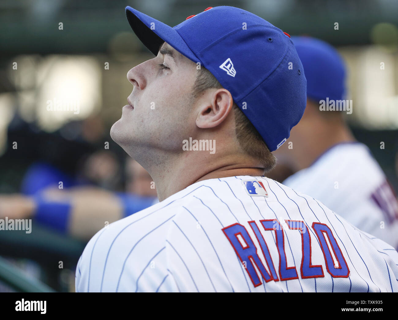 Chicago Cubs first baseman Anthony Rizzo looks on from dugout before ...