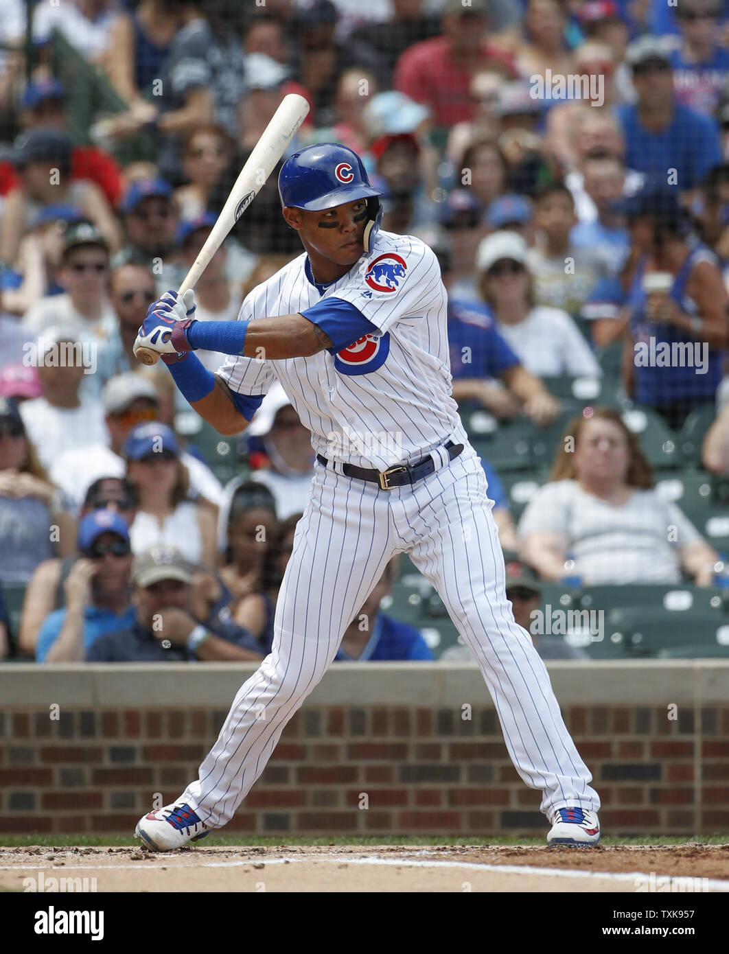 Chicago Cubs shortstop Addison Russell bats against the San Diego ...