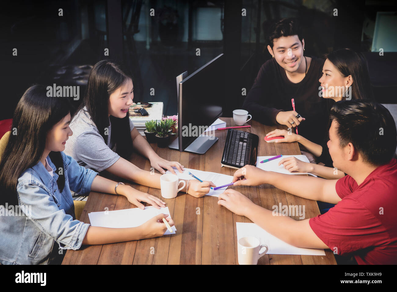 asian freelance team planing for teamwork in office meeting room Stock ...