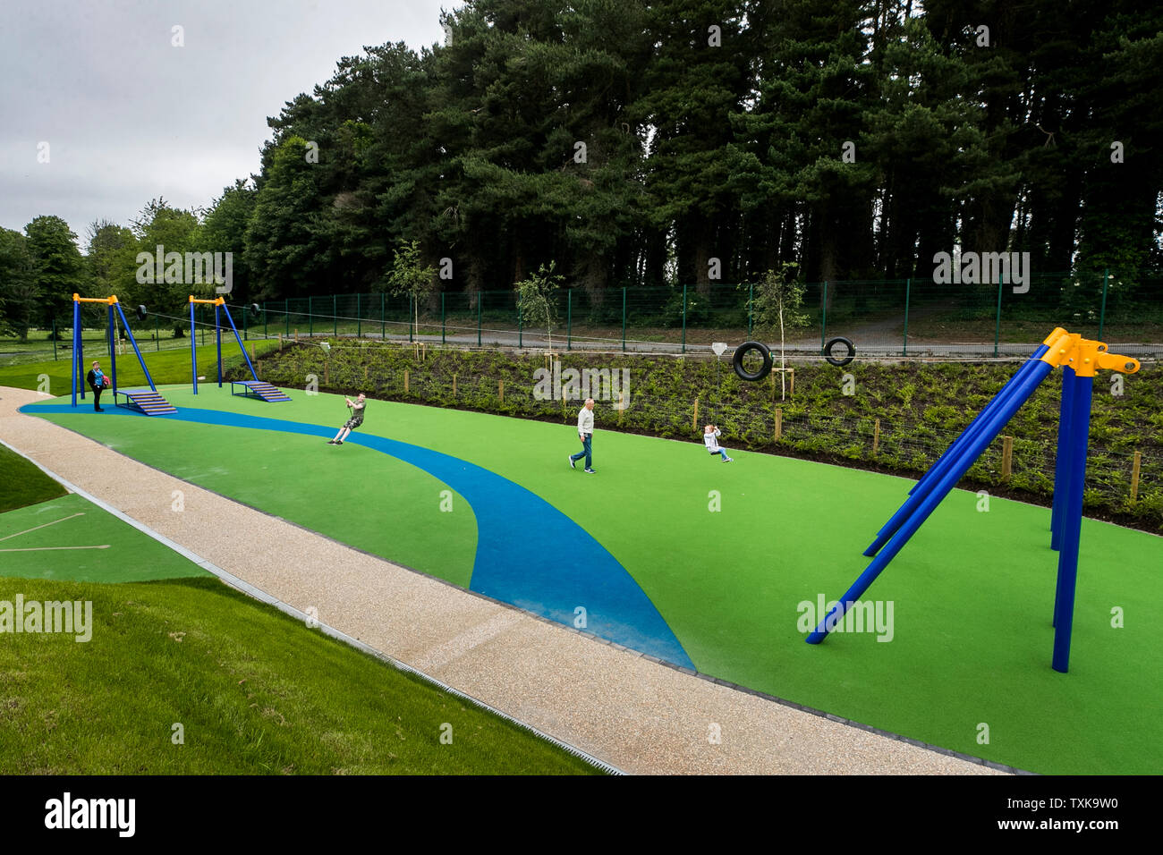 People enjoying the reopening of the Mo Mowlam play park at the ...