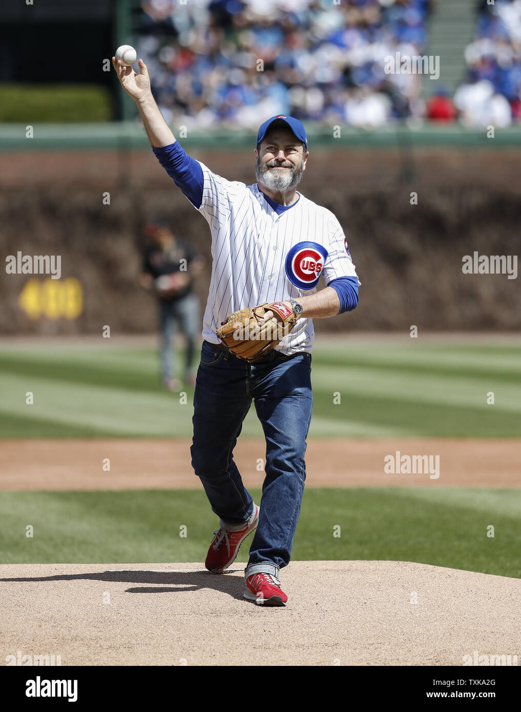 Actor Nick Offerman throws out ceremonial first pitch before a baseball ...