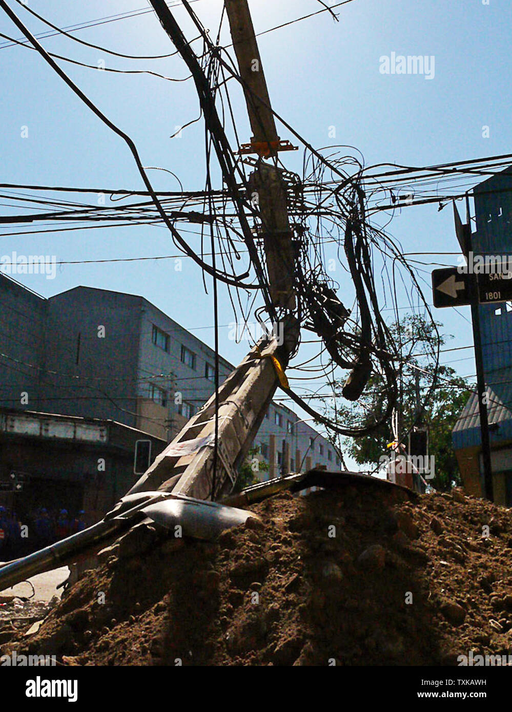 Damaged power-lines are seen tangled and destroyed in Santiago, Chile ...