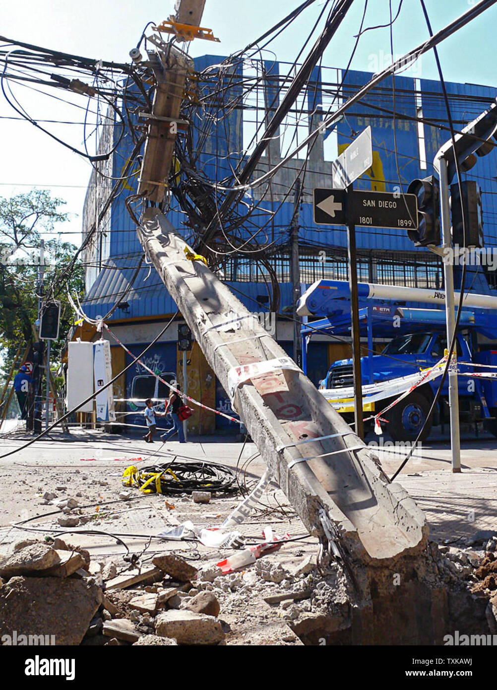 Damaged power-lines are seen tangled and destroyed in Santiago, Chile ...
