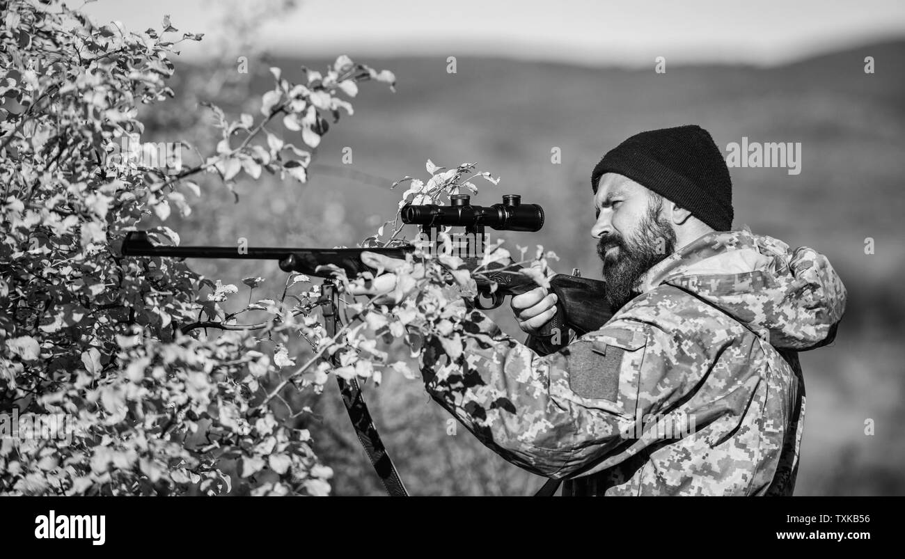 Bearded man with gun Black and White Stock Photos & Images - Alamy
