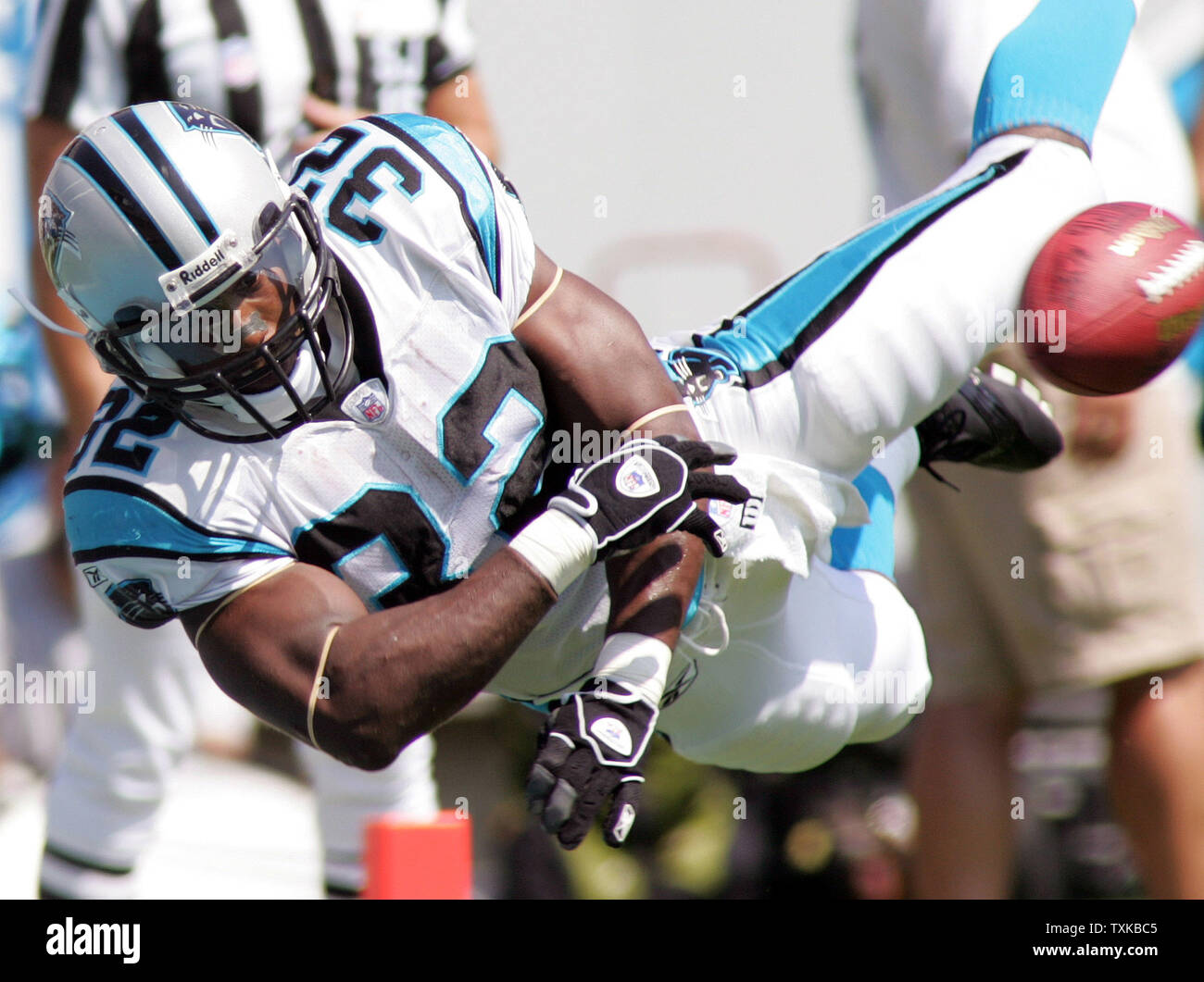 Carolina Panther Rod Smart (32), leaps and knocks the football back as ...