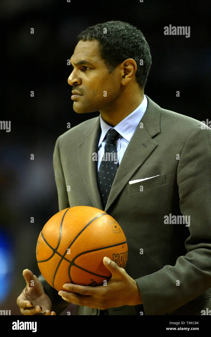 Philadelphia 76ers head coach Maurice Cheeks catches a loose ball as ...