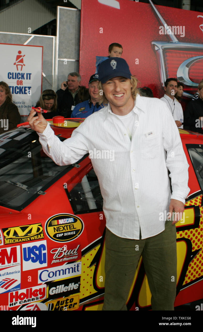 Actor Owen Wilson (Lightning McQueen) shows off his race car in front ...