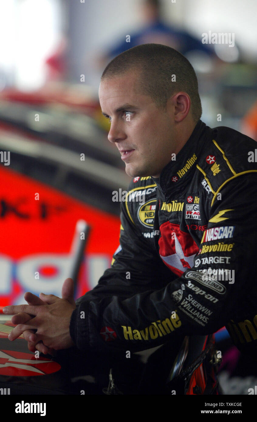 NASCAR race car driver Casey Mears talks in the garage before the start ...