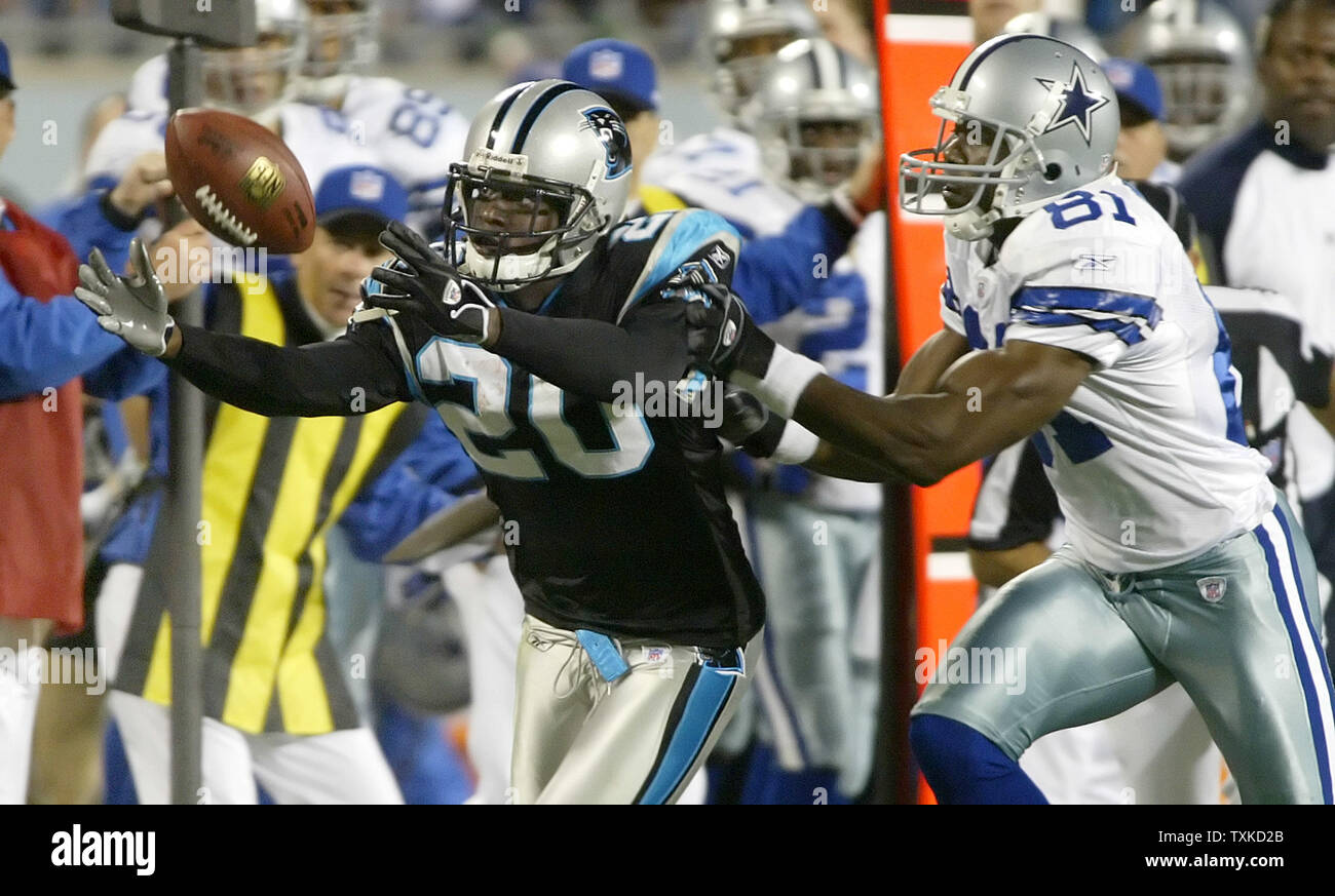 Carolina Panthers cornerback Chris Gamble, left, pulls in an ...