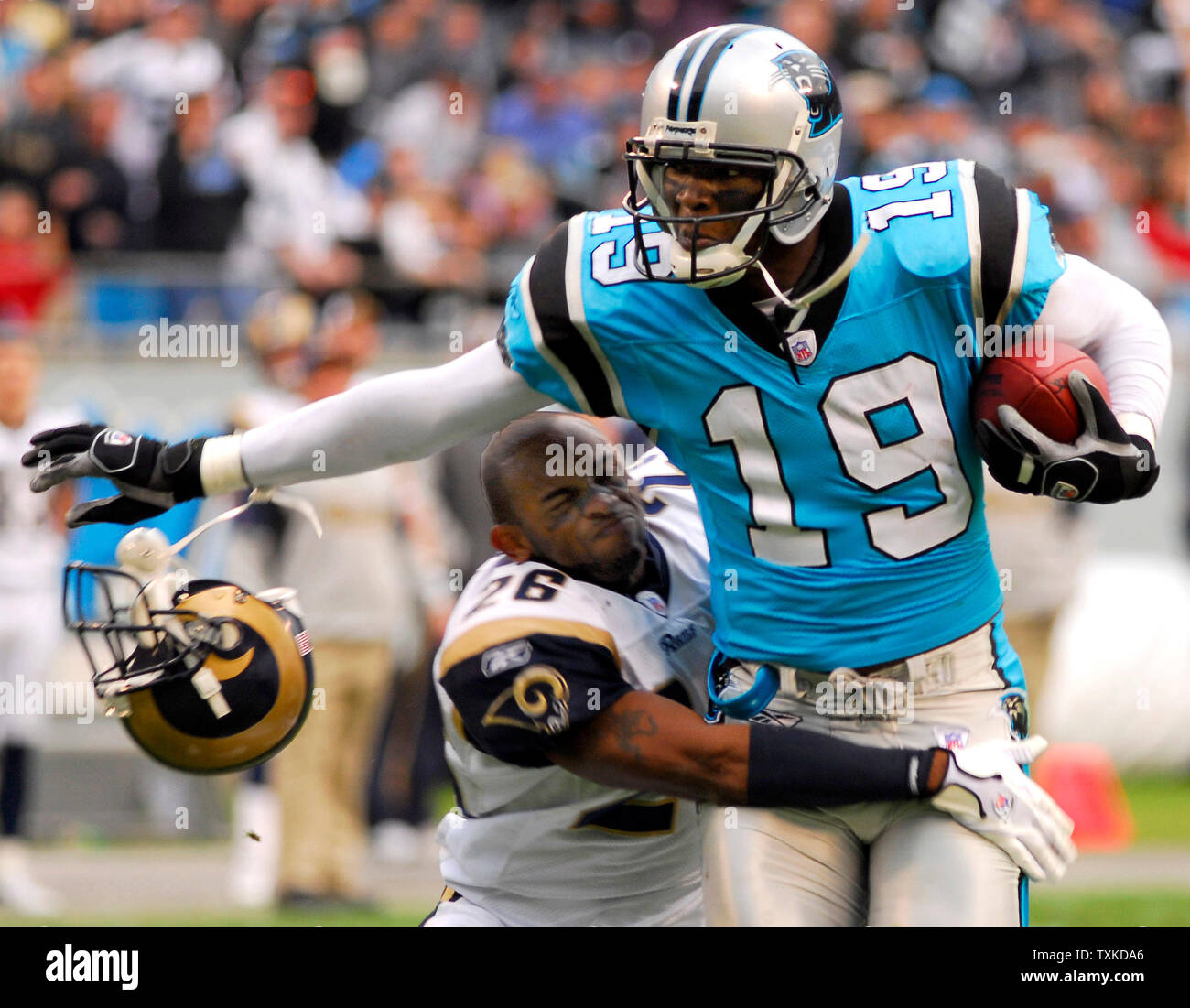 Carolina Panthers wide receiver Keyshawn Johnson (19) knocks the helmet ...