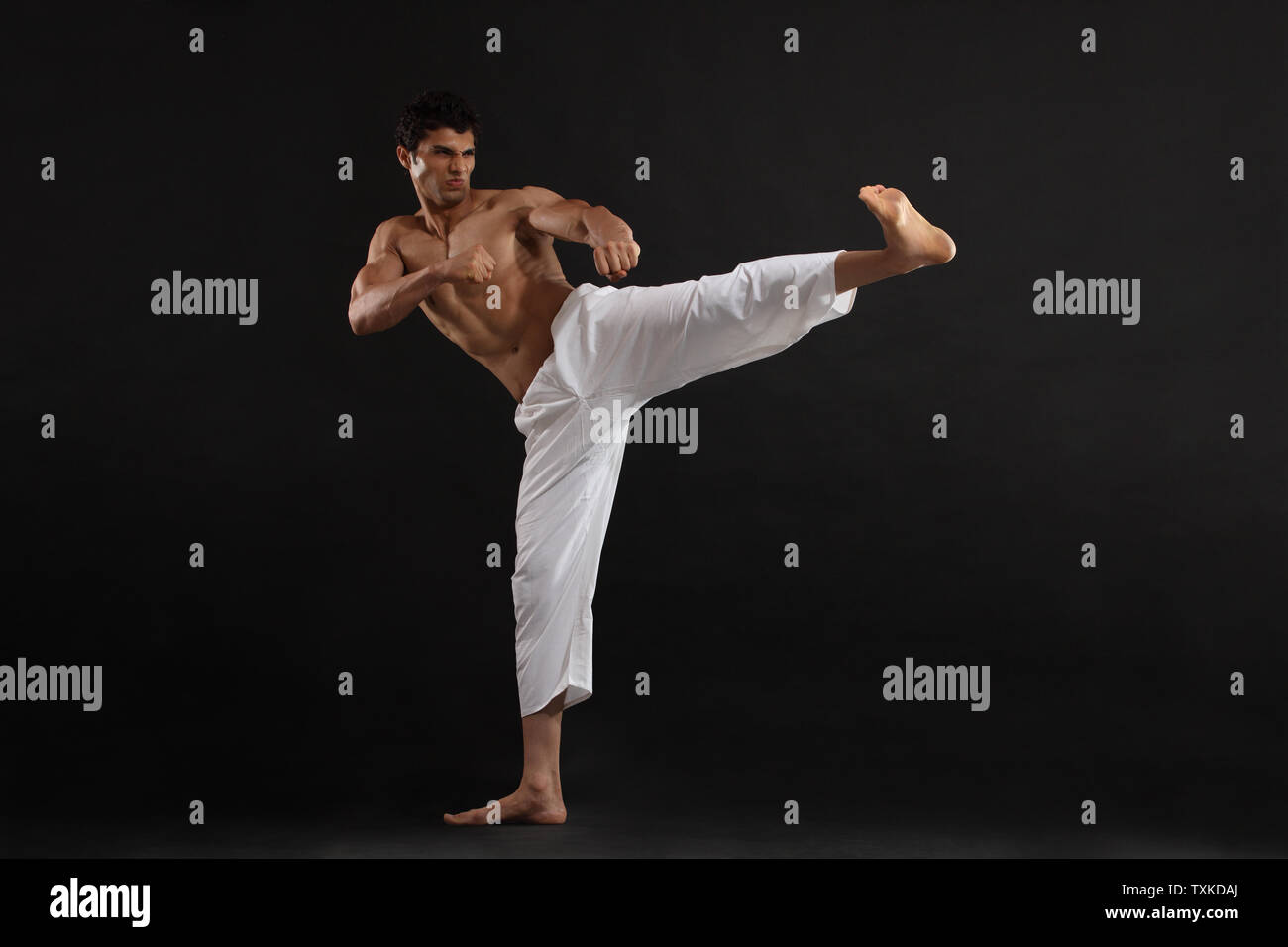 Man in judo stance Stock Photo - Alamy