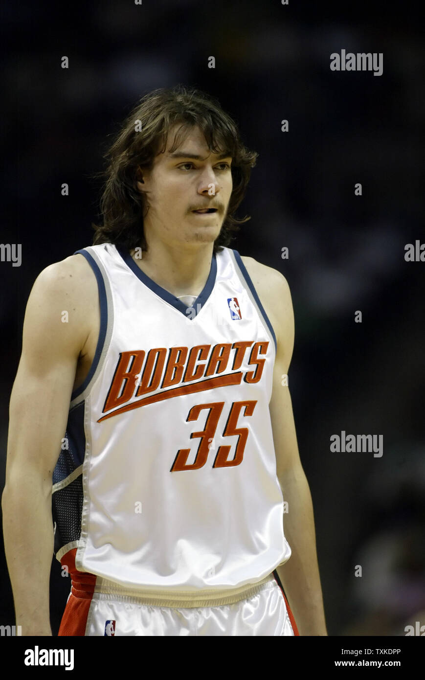 Charlotte Bobcats forward Adam Morrison looks to the bench in the ...