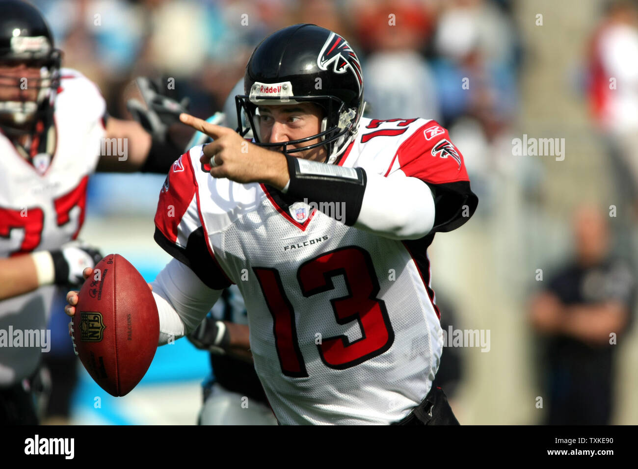 Atlanta Falcons quarterback Joey Harrington looks for a receiver as the ...