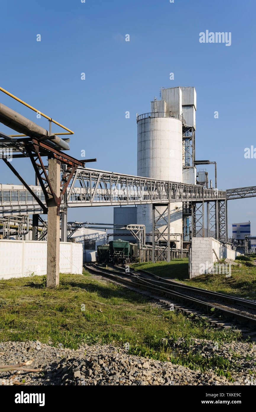 Cement plant. Tower of the tank. Location for loading cement into ...