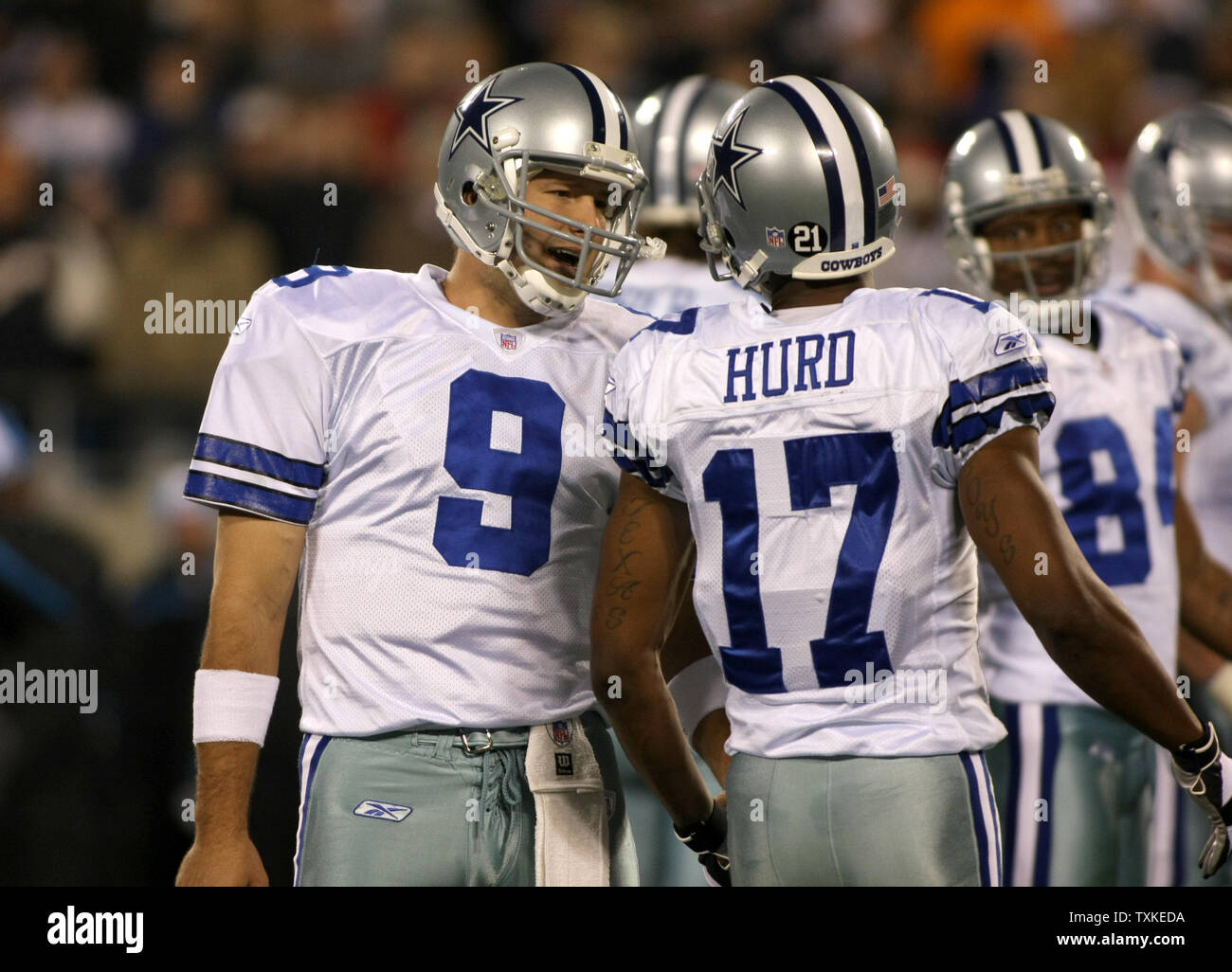 Dallas Cowboys quarterback Tony Romo (9) talks to Dallas Cowboys wide ...